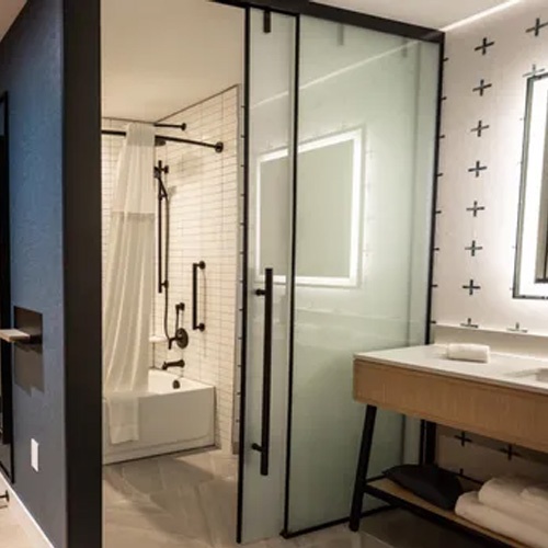 Bathroom glass doors for Canopy by Hilton